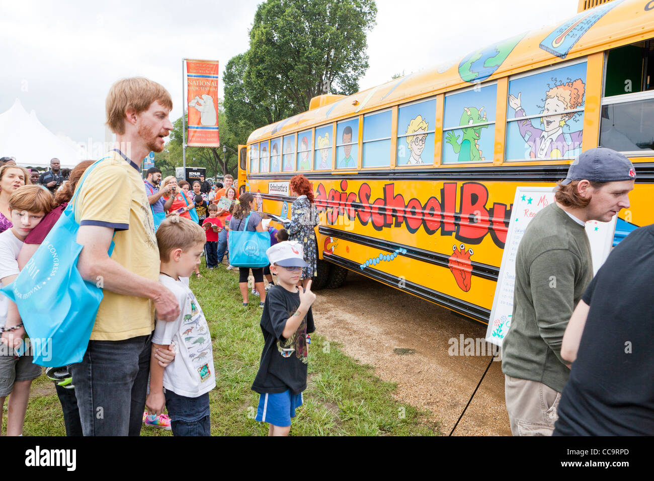 Kids and parents boarding a school bus Stock Photo - Alamy