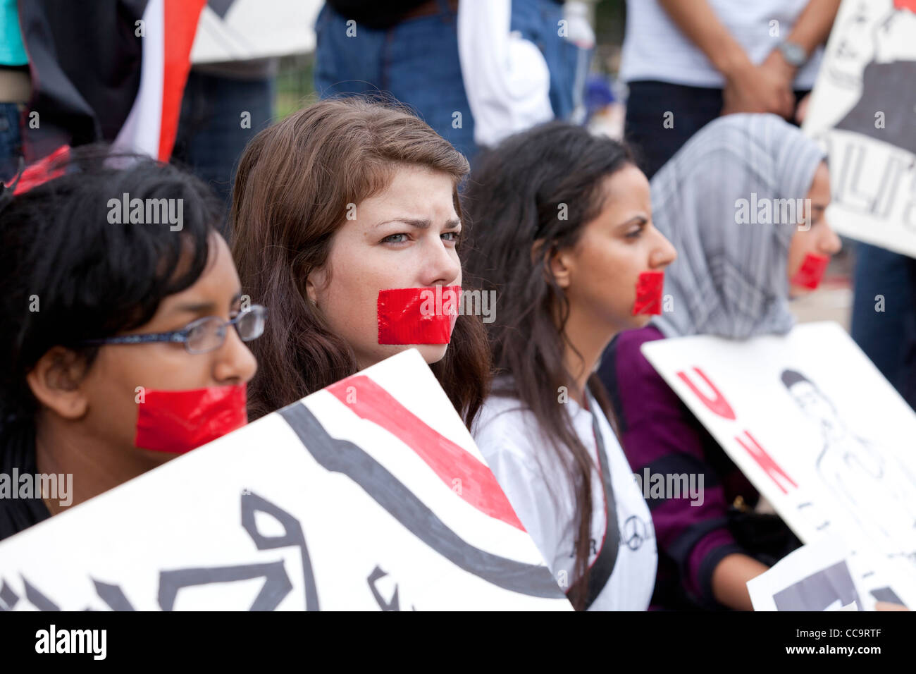 Women taped mouth hi-res stock photography and images - Alamy
