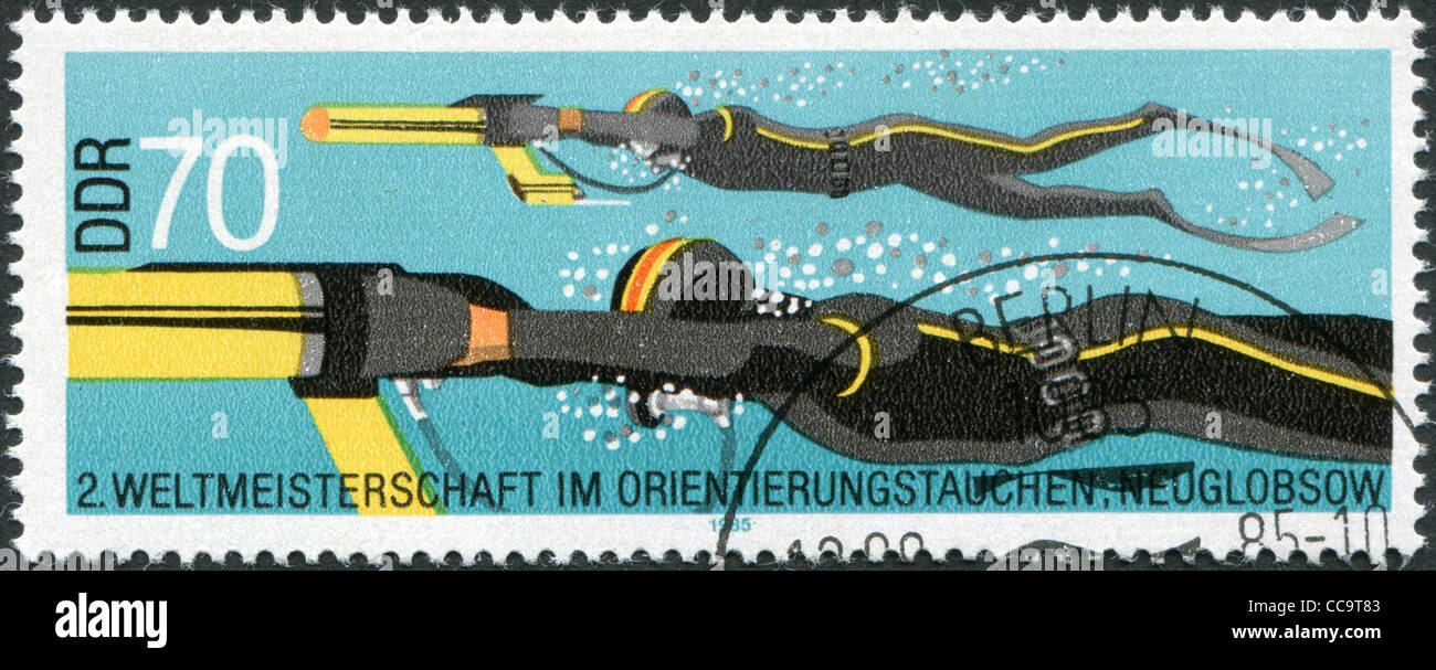 A stamp printed in DDR, is dedicated to 2nd World Orienteering and Deep ...