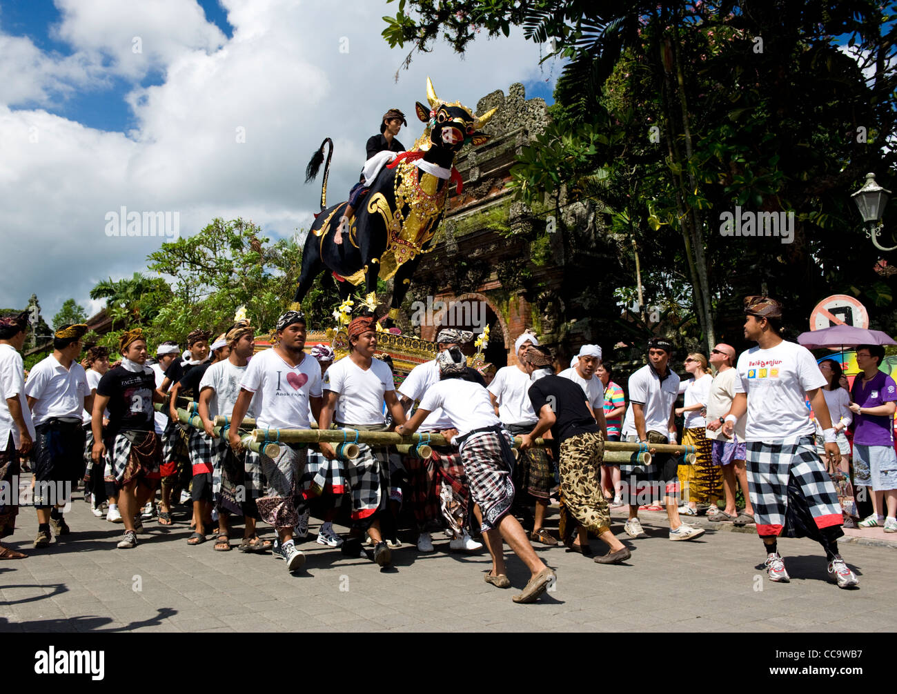 A float is carried as part of a religious parade through the Balinese ...