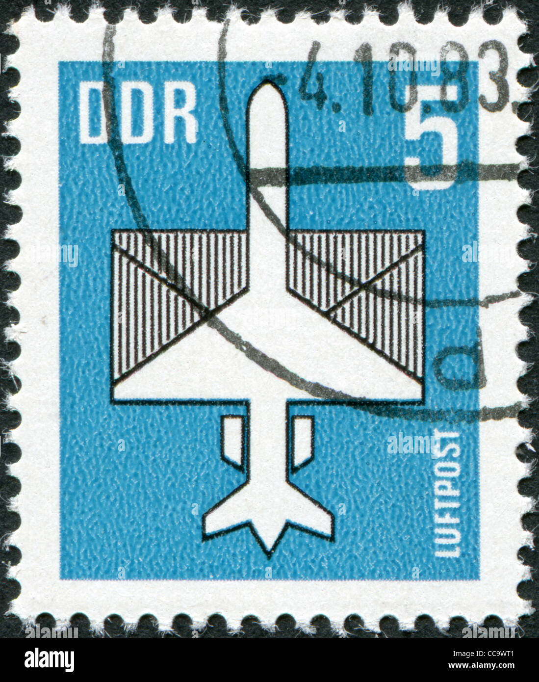 DDR - CIRCA 1983: A stamp printed in DDR, shows a stylized airplane ...