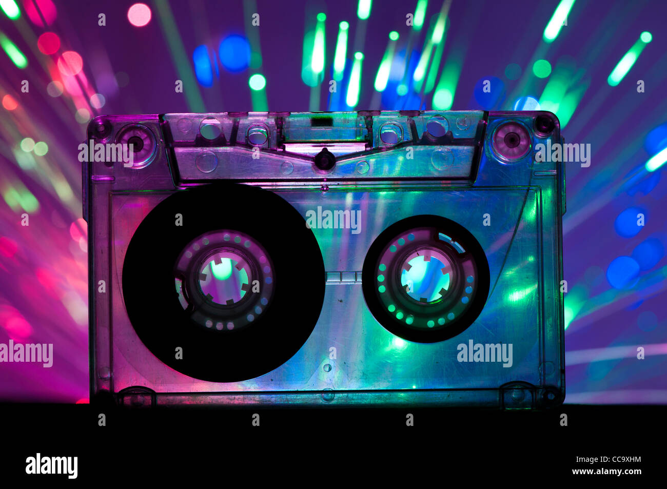Transparent Cassette tape and blue pink color disco light background ...