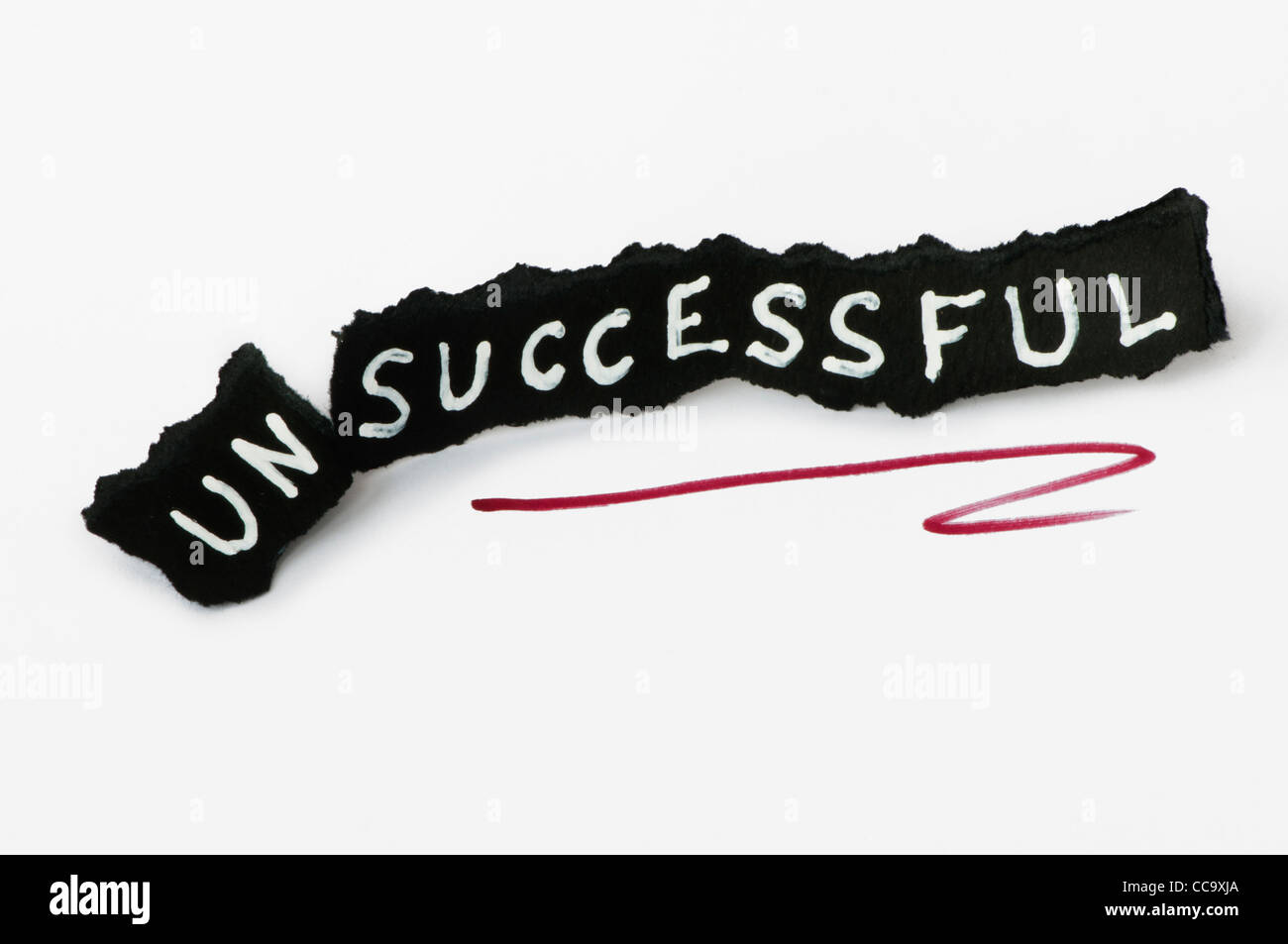 Success text over black paper. Unsuccessful and successful conception ...