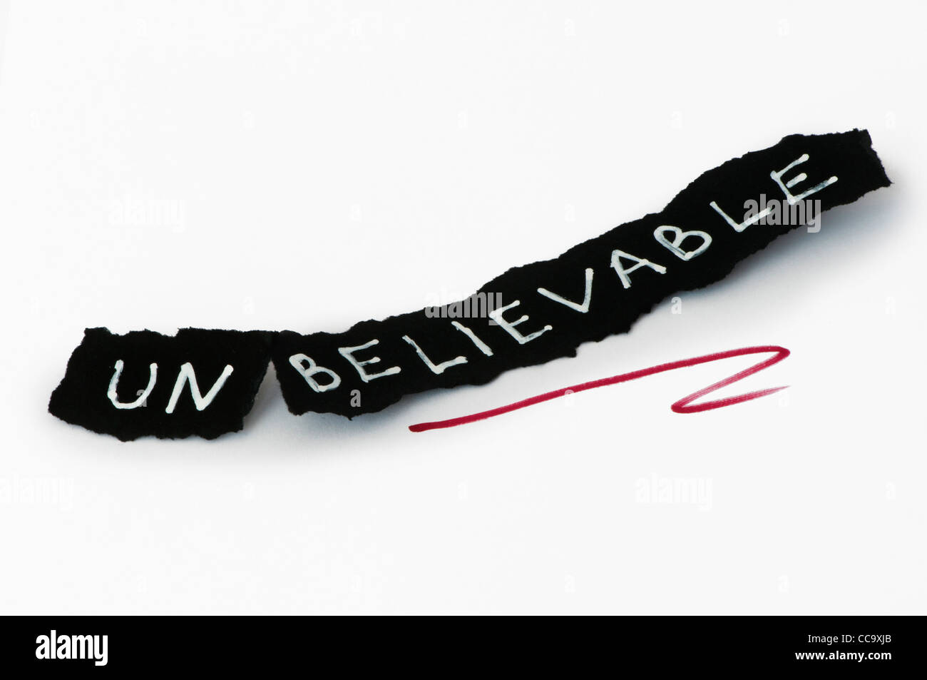 Believable text over black paper. UnBelievable and Believable ...