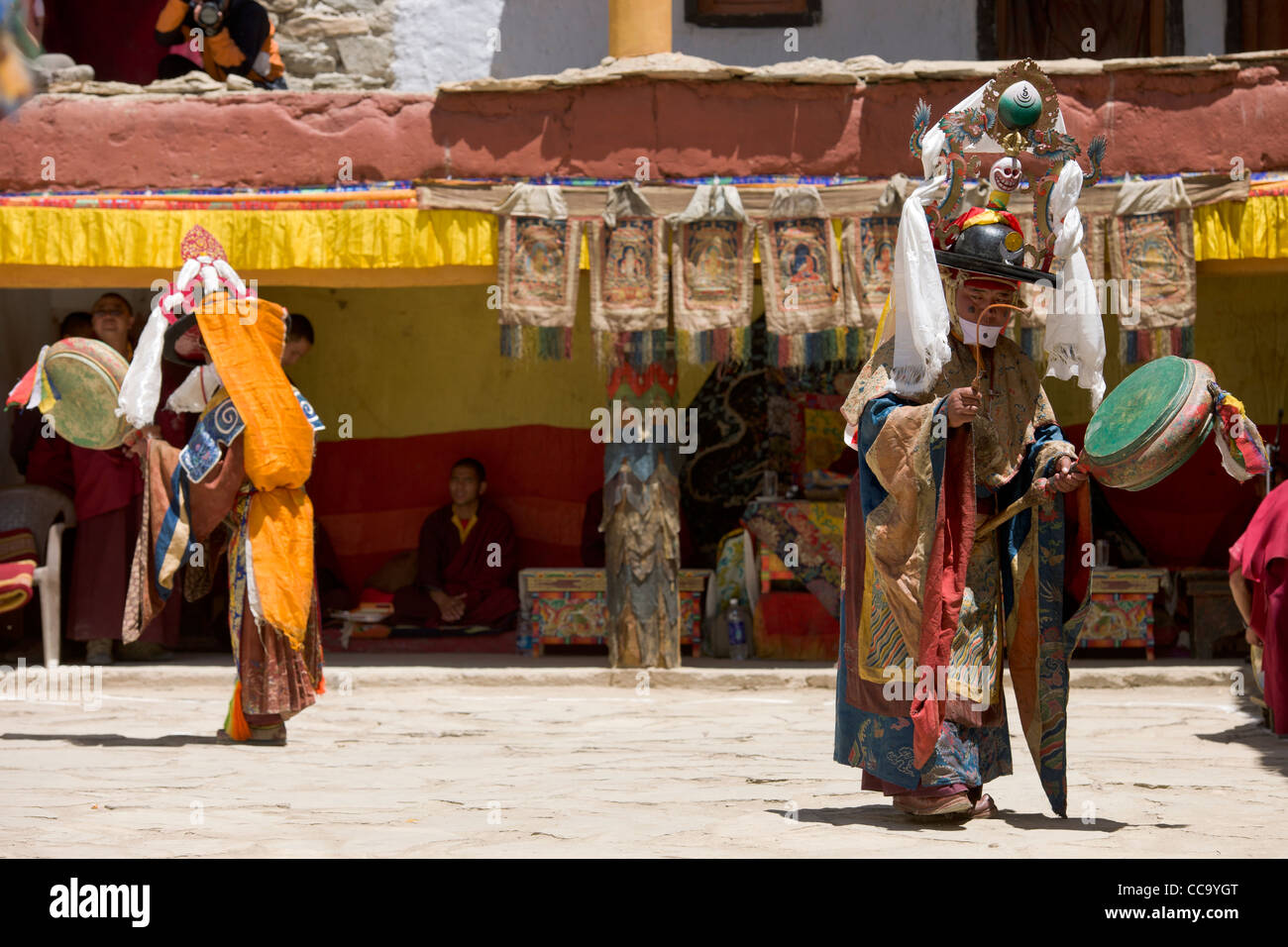 Cham dancers performing the Black Hat Dance (shana) with a drum in the ...