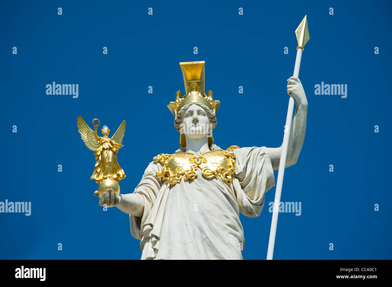 white stone woman sculpture head with gold crown near Parliament House ...