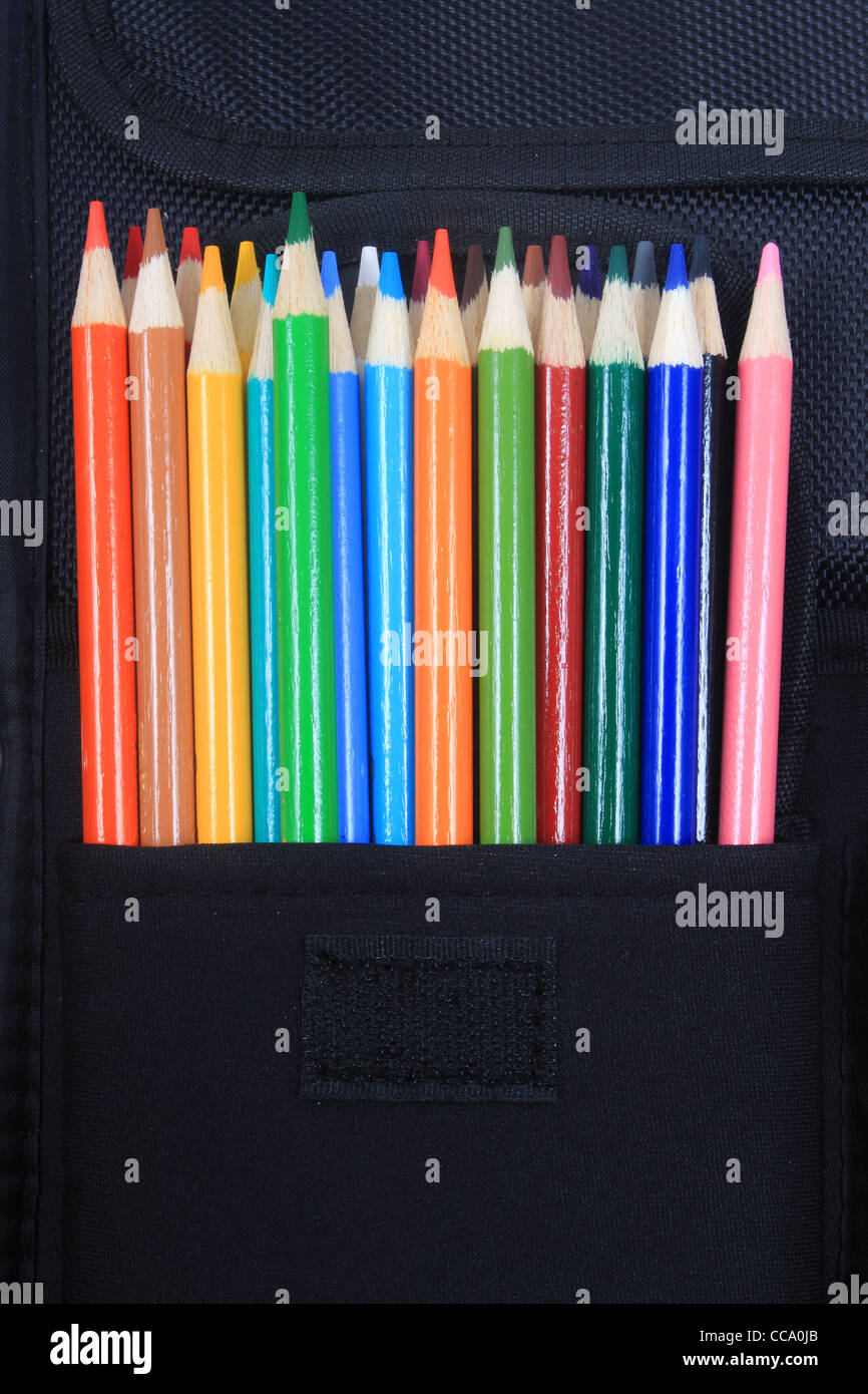 Colorful sharpened pencil crayons for school in three ring binder ...
