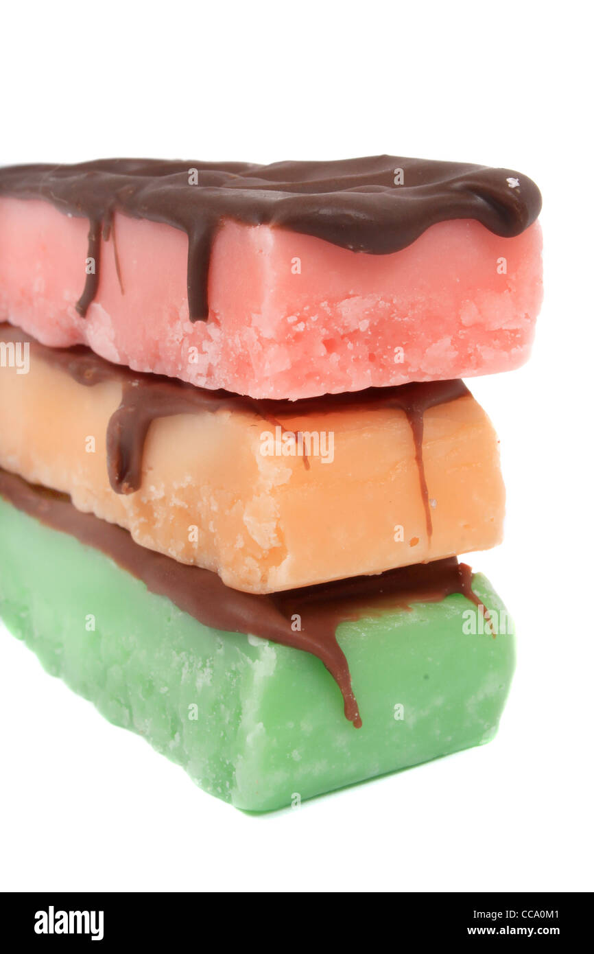 Three fudge bars in three color and flavors like mint, orange and ...