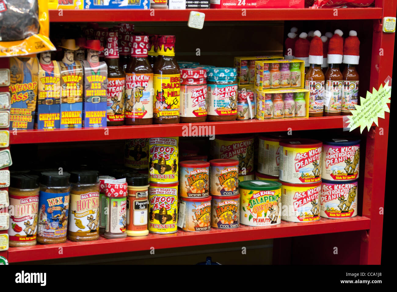 Assortment of hot sauce on store shelf Stock Photo - Alamy
