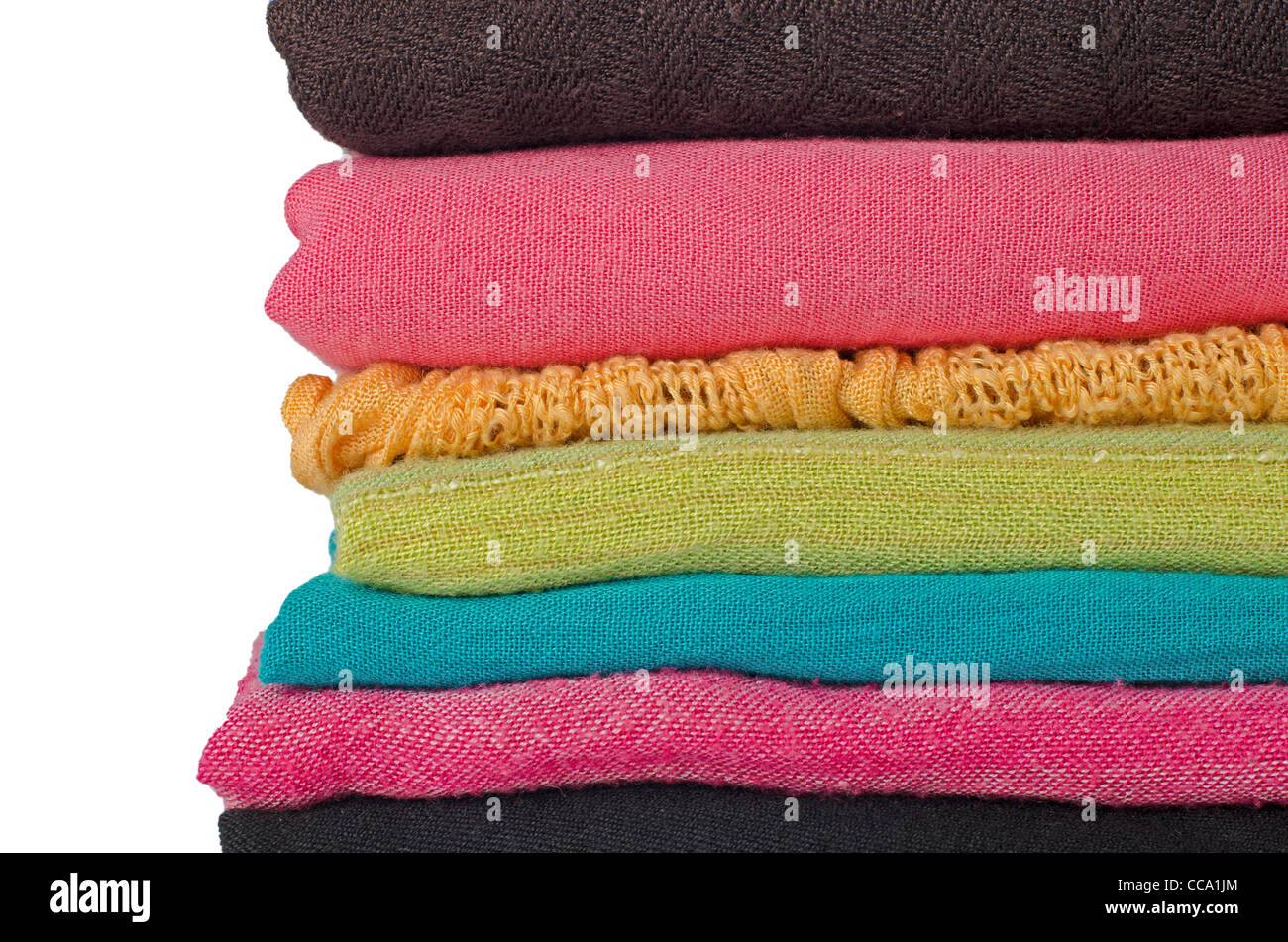 Pile of colorful scarves over white background Stock Photo - Alamy