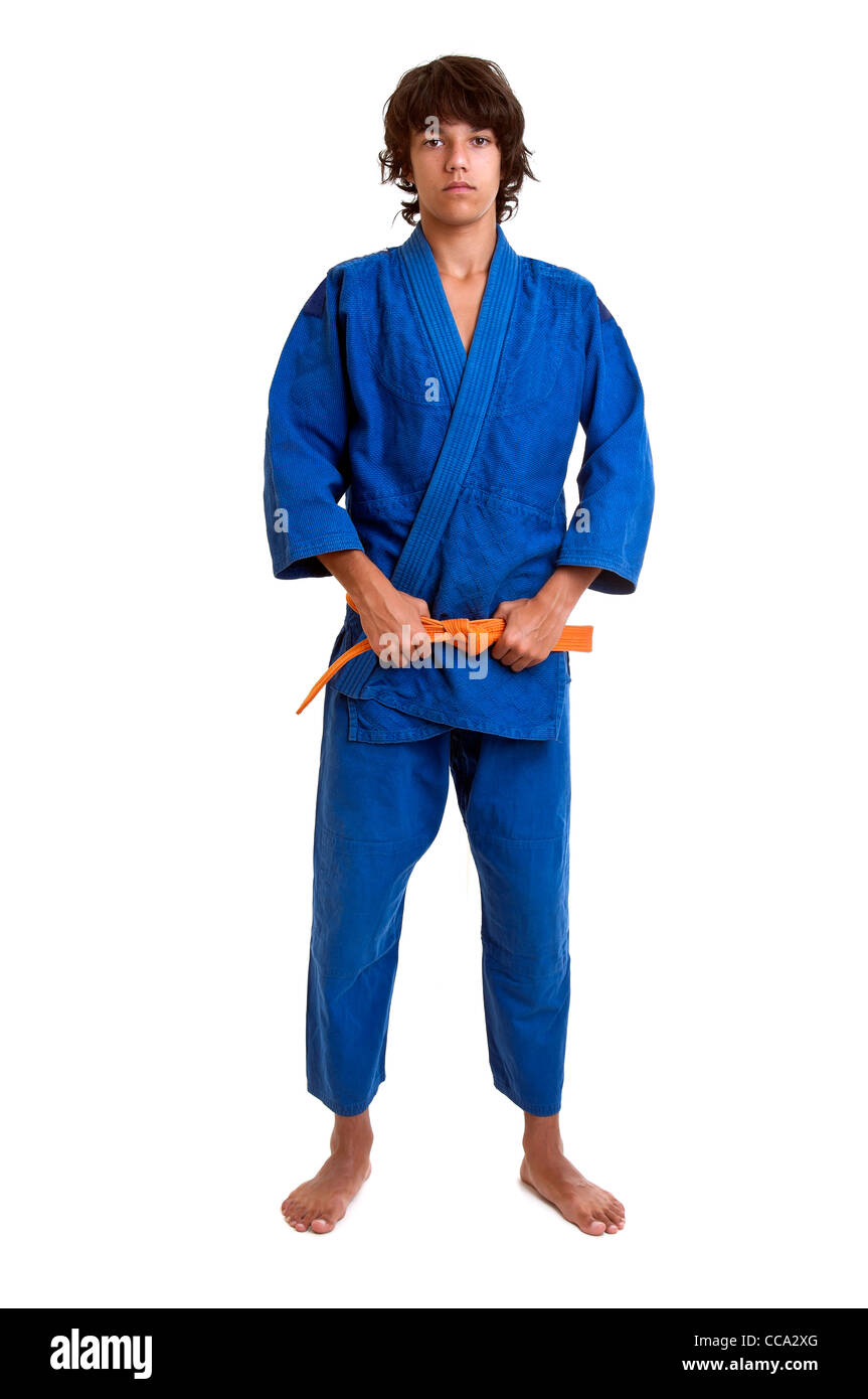 Young fighter posing against a white background Stock Photo - Alamy