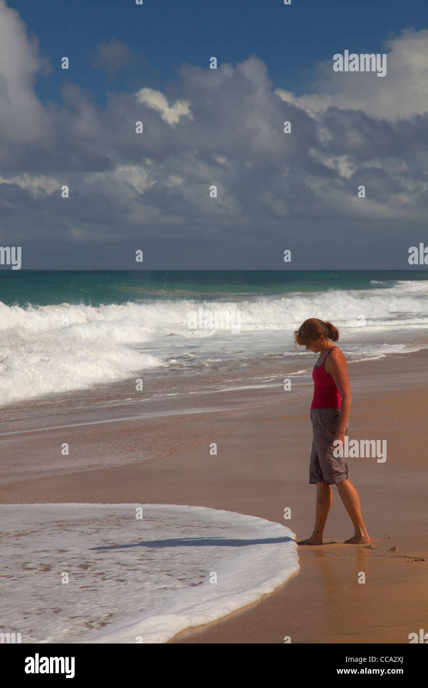 Hiker at Hanakapi'ai Beach along the Kalalau Trail, Na Pali Coast ...