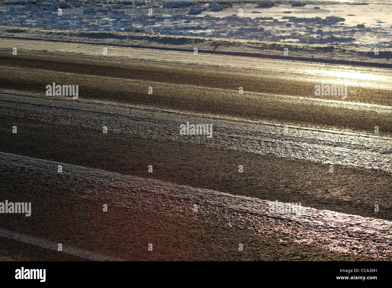 Icy pavement in the sun Stock Photo - Alamy