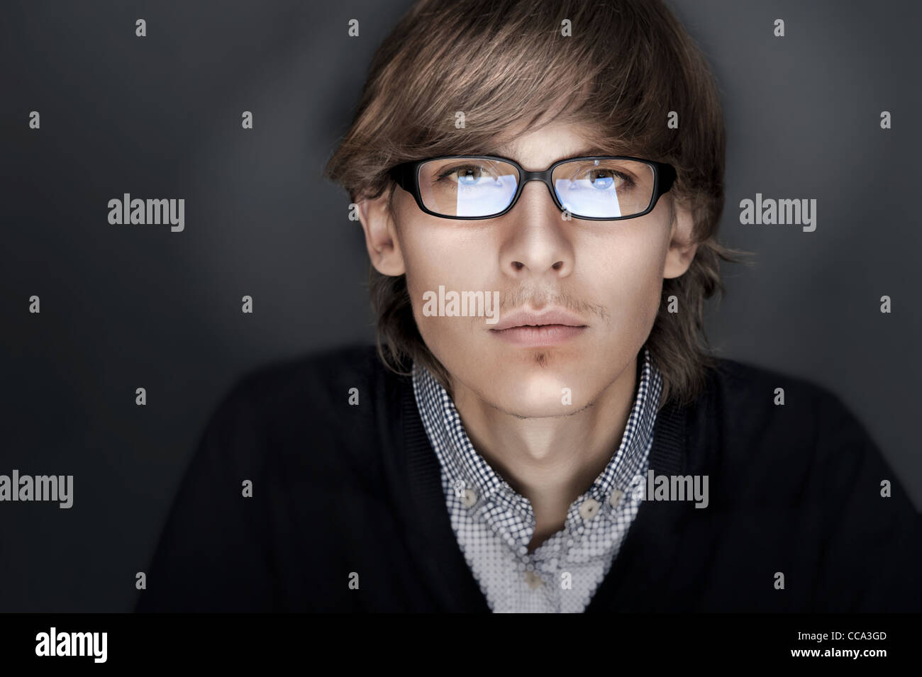 Portrait of young esquire man with smart and wise look. Looking at ...