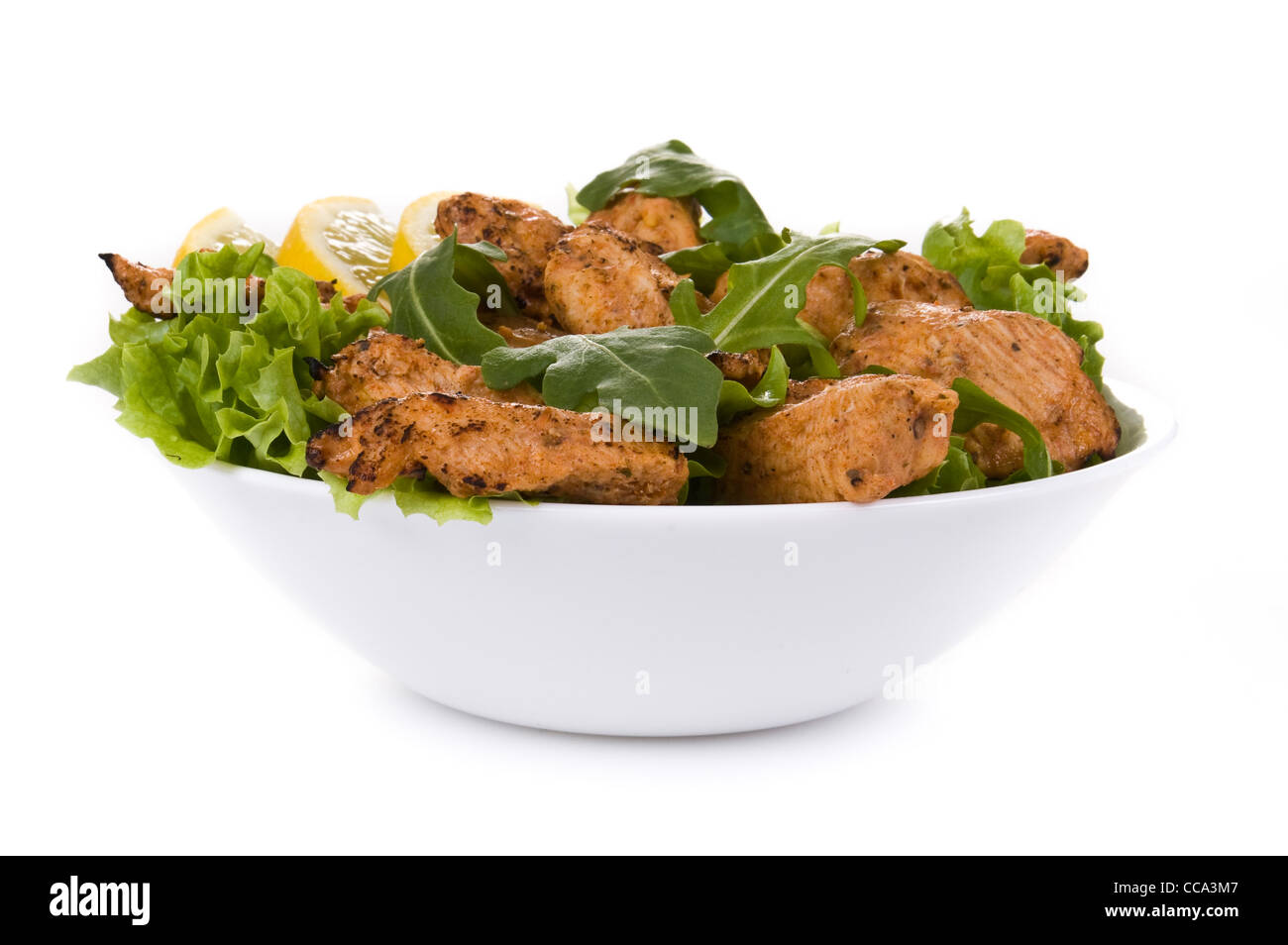 Fresh chicken salad isolated on white background Stock Photo - Alamy