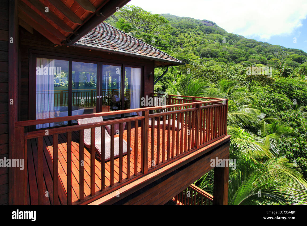 House in tropical vegetation Stock Photo - Alamy