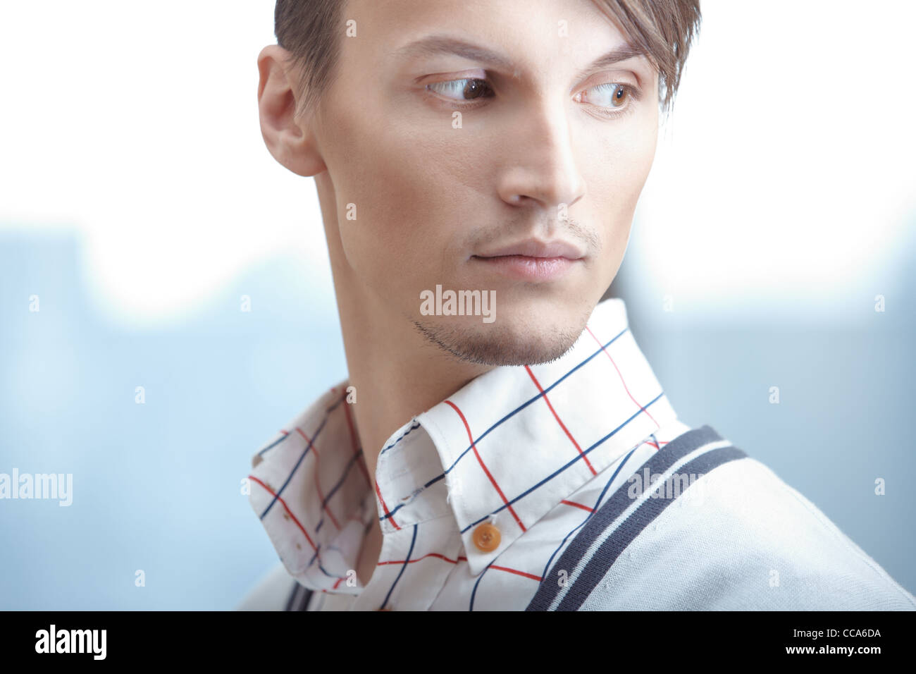 Attractive young man in modern clothes at his office Stock Photo - Alamy