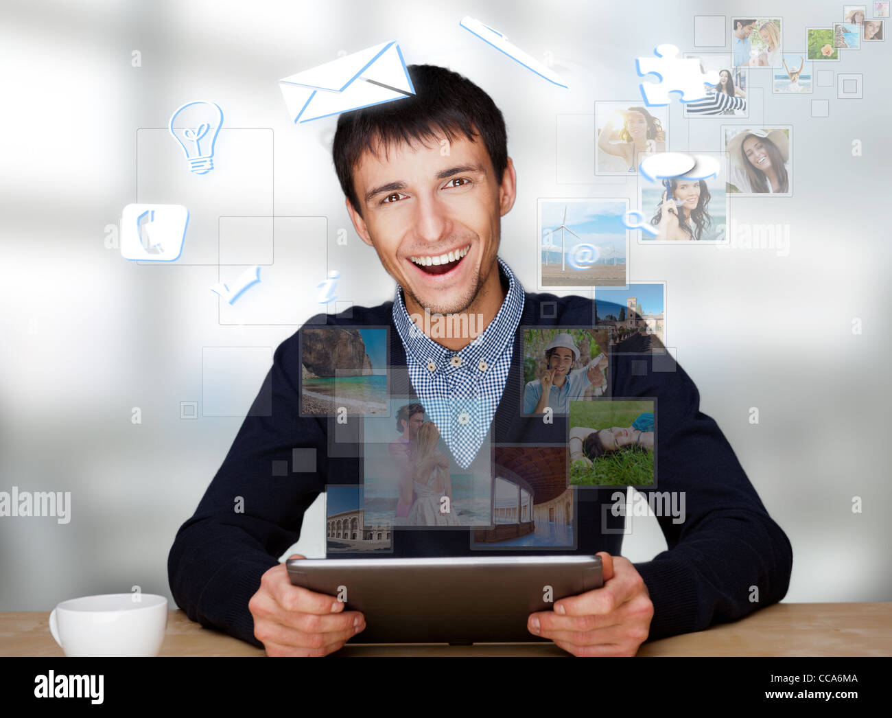 A businessman with icons floating around his head. Portrait of handsome ...