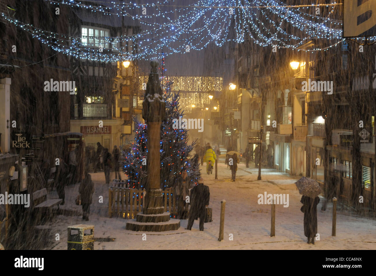 The Roman City of Chester at night during the winter covered in snow ...