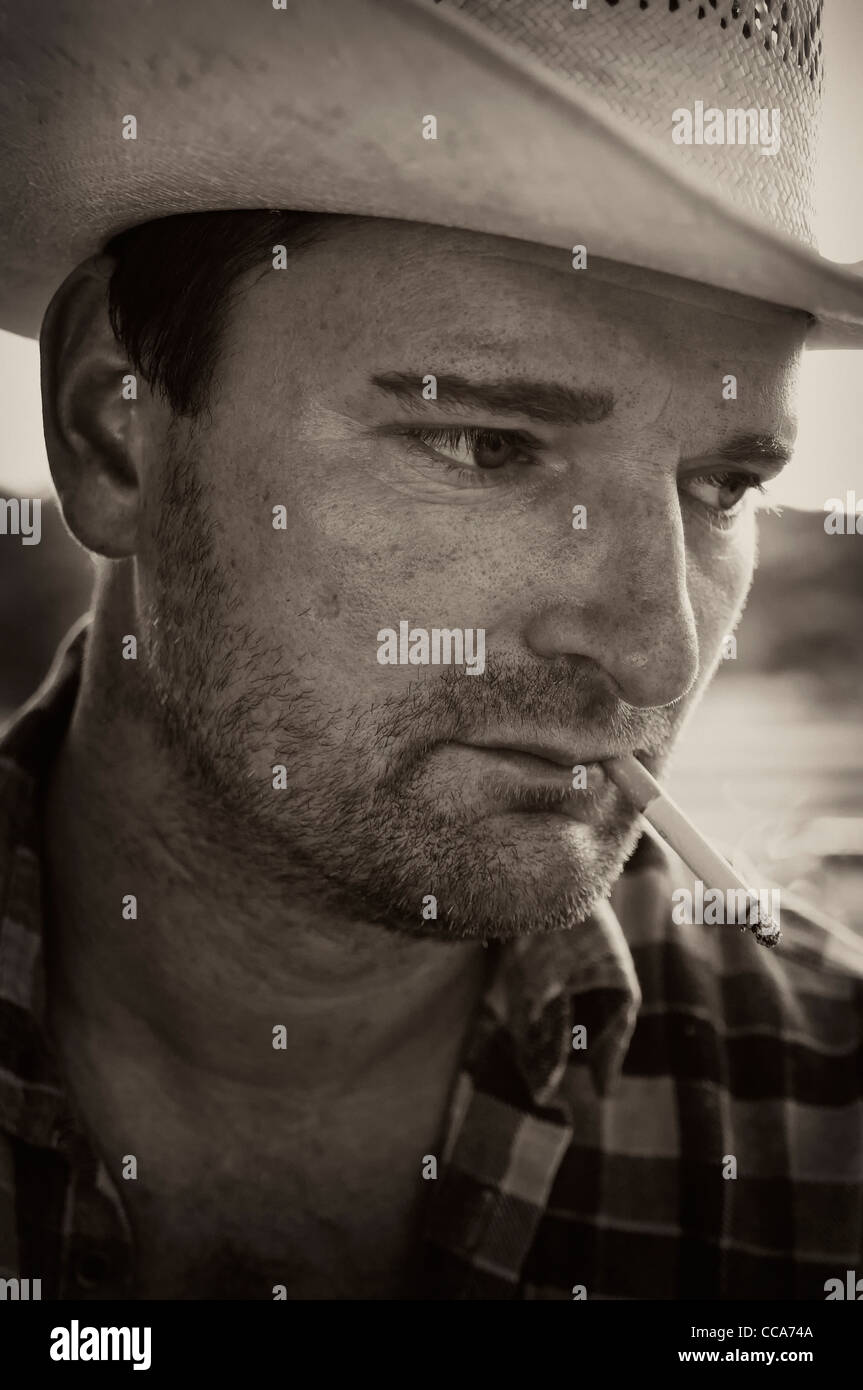 Man smoking cigarette Stock Photo - Alamy