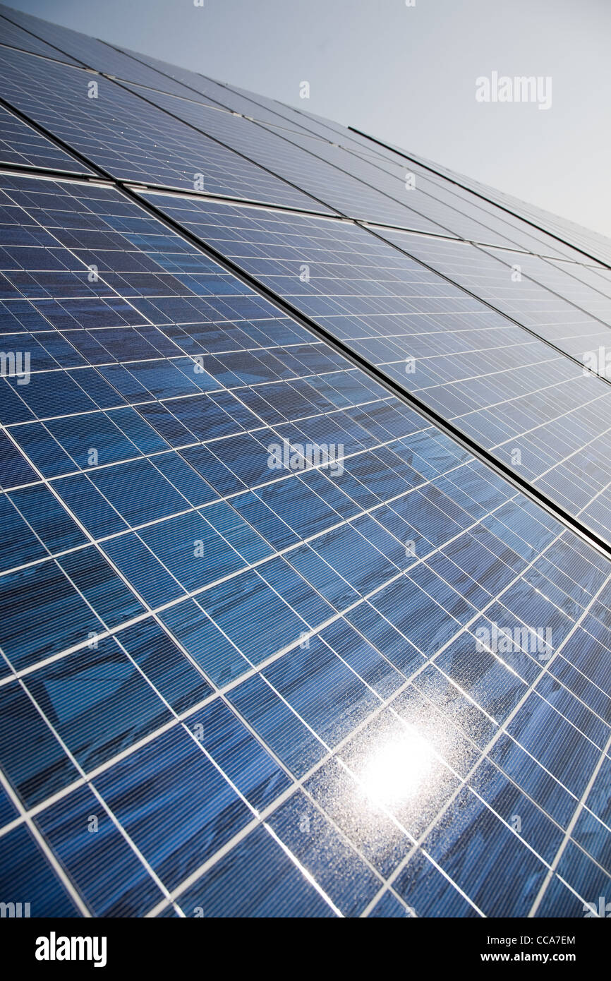 Line of solar power plant panels and clouds Stock Photo - Alamy