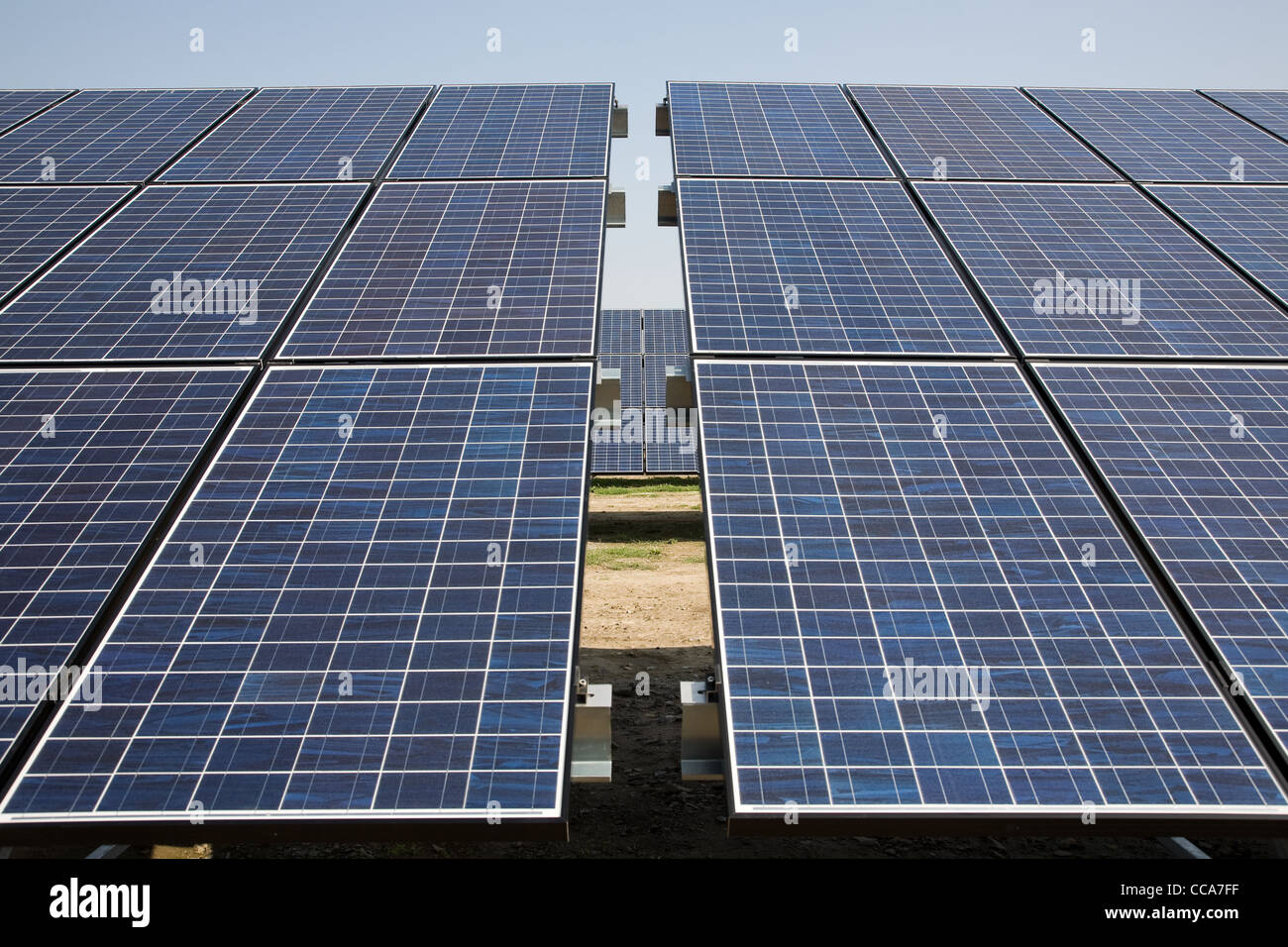 Line of solar power plant panels and clouds Stock Photo - Alamy