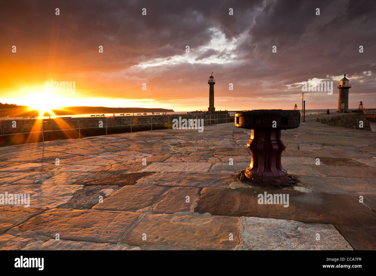 Sunset over Whitby Harbour in North Yorkshire England Stock Photo - Alamy