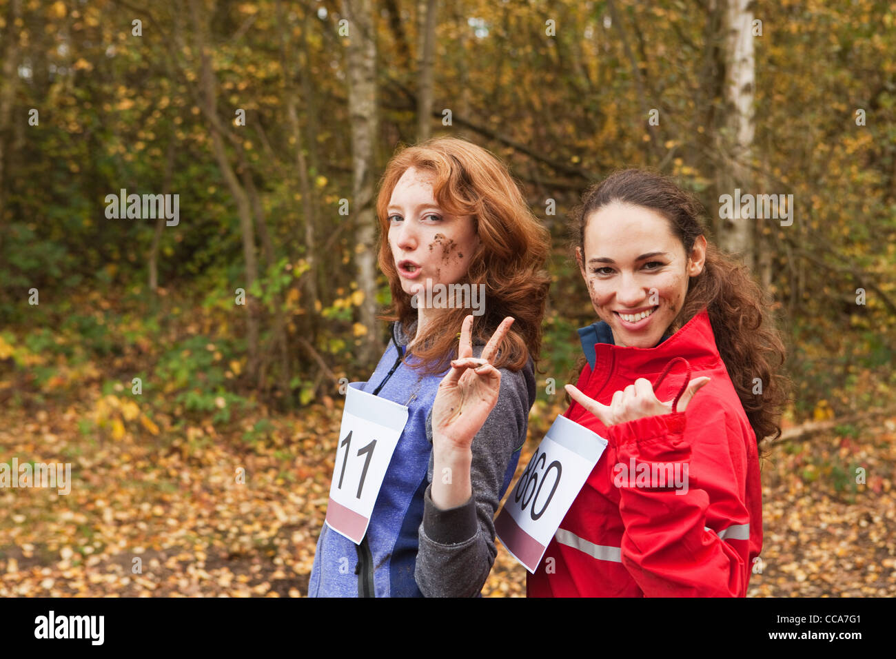 Young women smiling in forest, portrait Stock Photo - Alamy