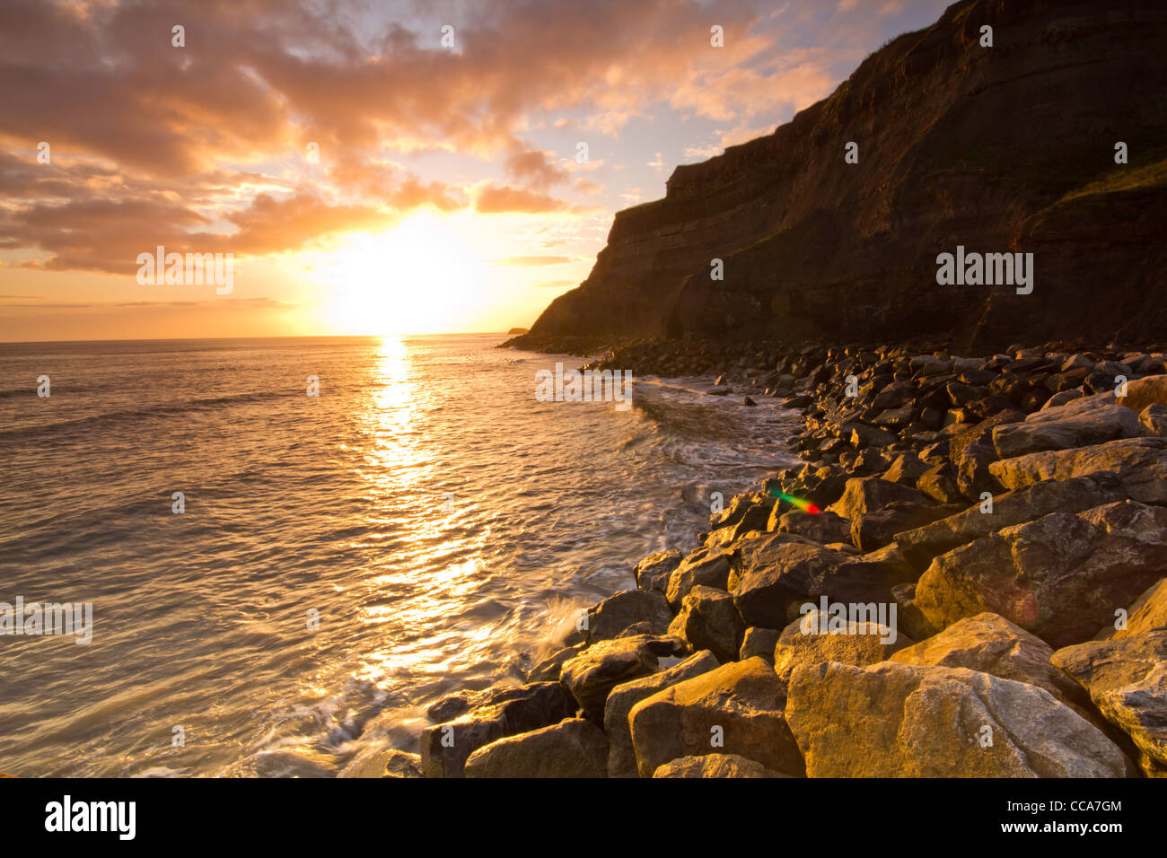 Sunset over Whitby Harbour in North Yorkshire England Stock Photo - Alamy