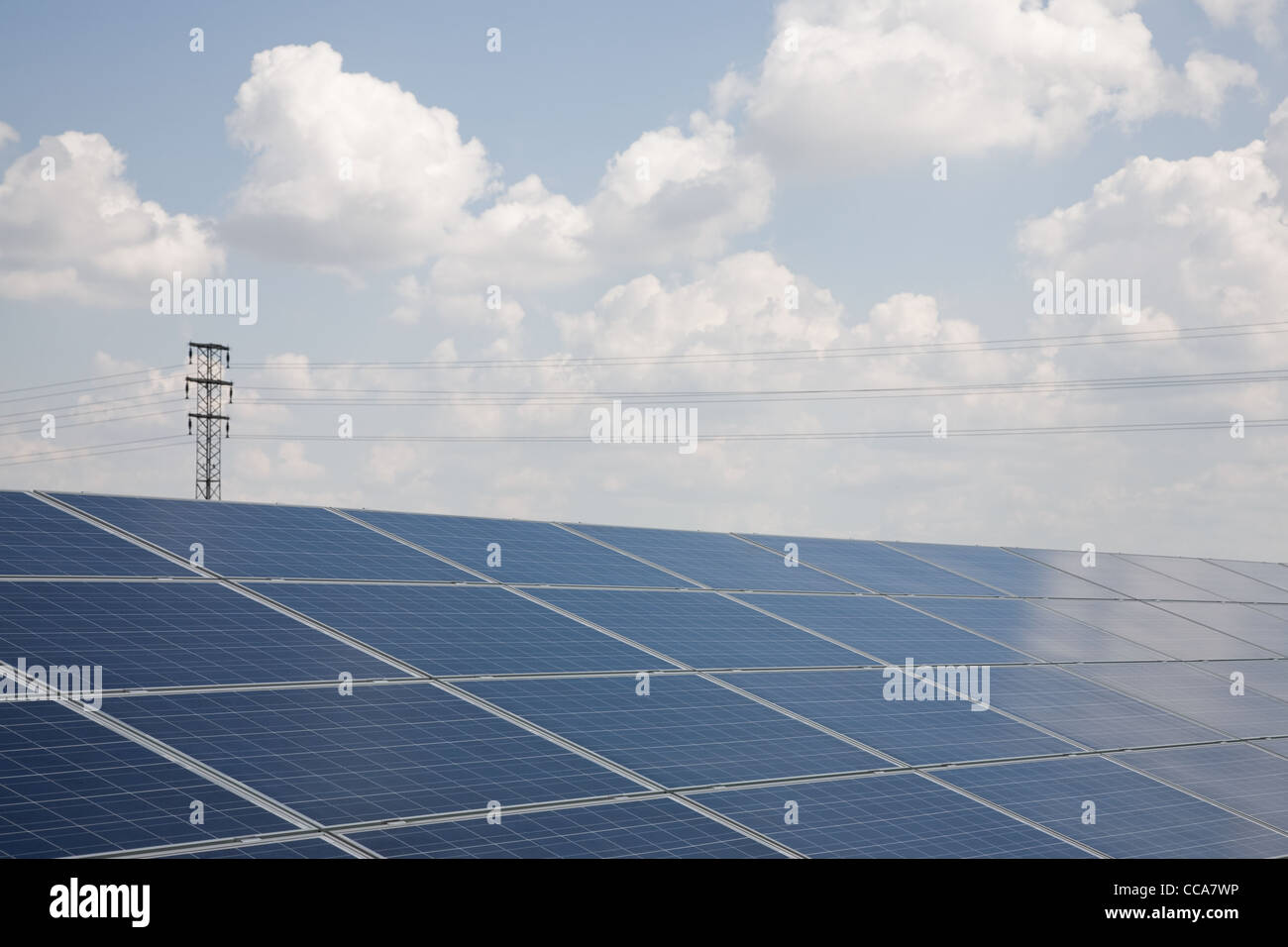 Line of solar power plant panels and clouds Stock Photo - Alamy