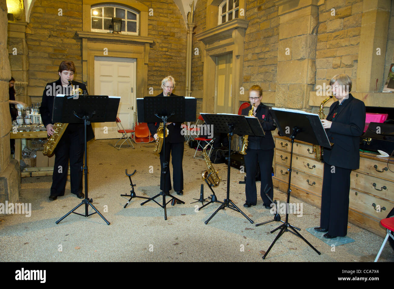 Four female musicians playing in courtyard at Chatsworth Derbyshire ...