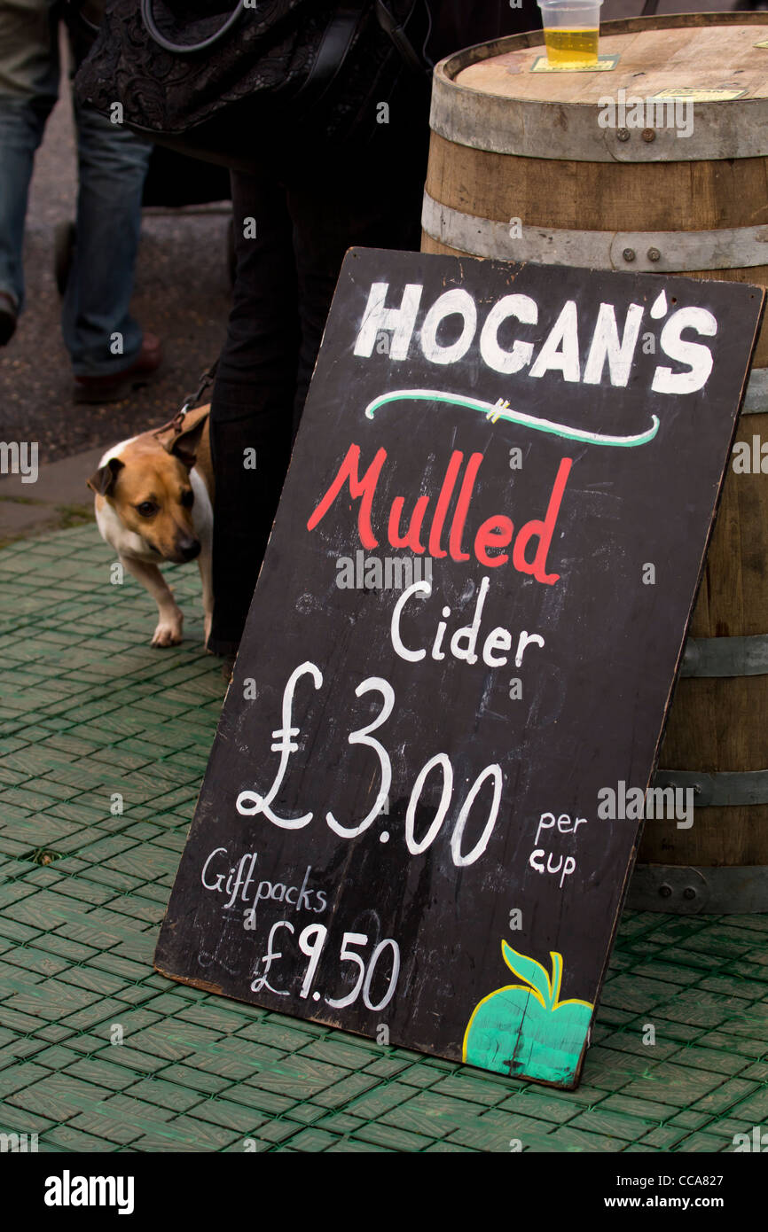 little dog looking at sign selling mulled cider at Chatsworth Christmas ...