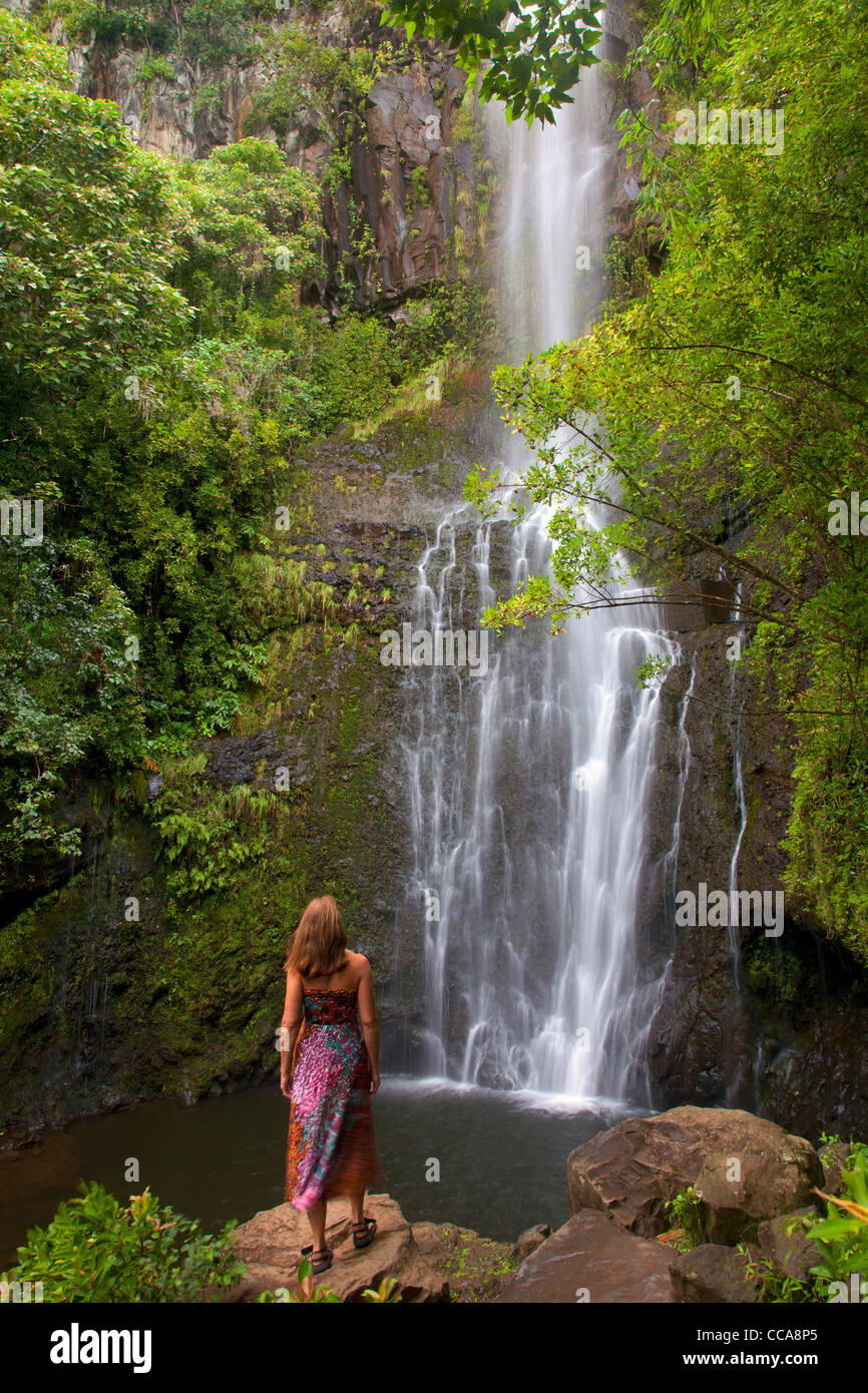 A visitor at Wailua Falls, near Hana, Maui, Hawaii. (model released ...
