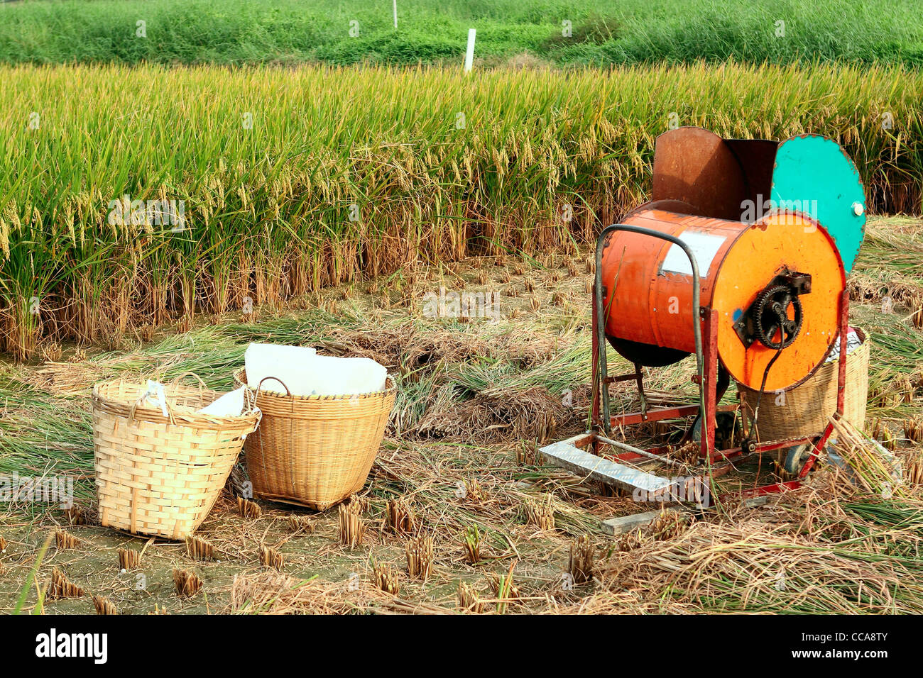 Vintage rice wood machine Stock Photo - Alamy