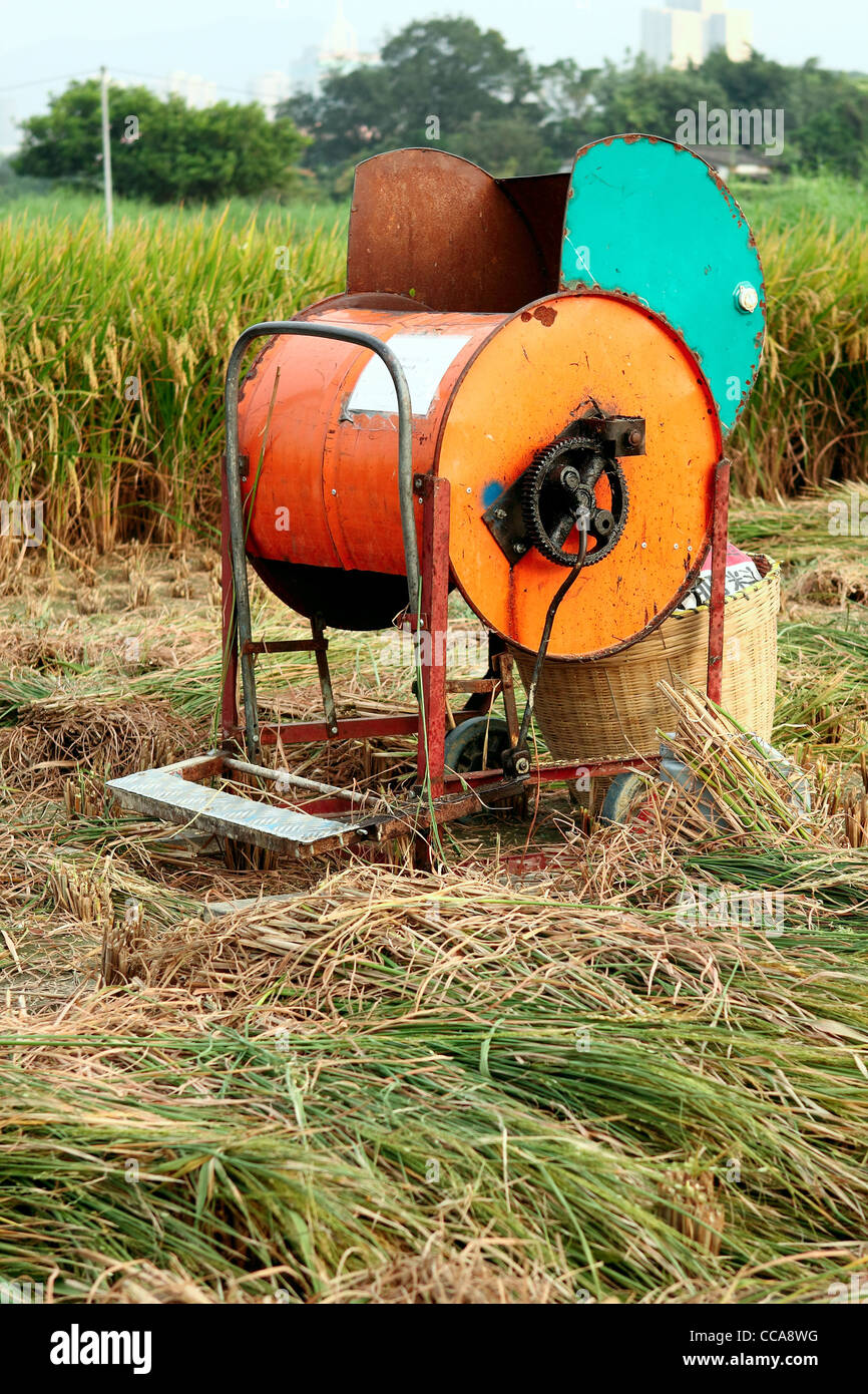 Vintage rice wood machine Stock Photo - Alamy