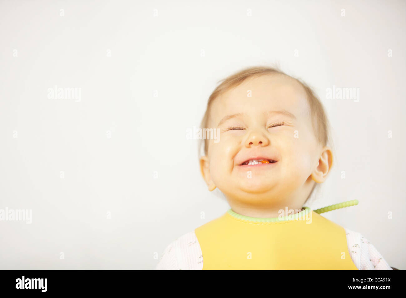 Baby Girl Grinning Stock Photo - Alamy