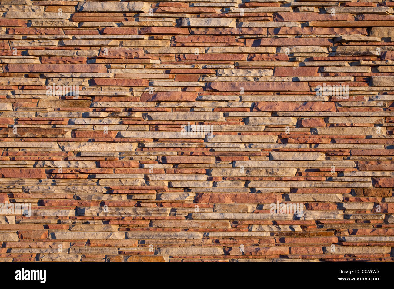 decorative sandstone wall - building exterior Stock Photo - Alamy