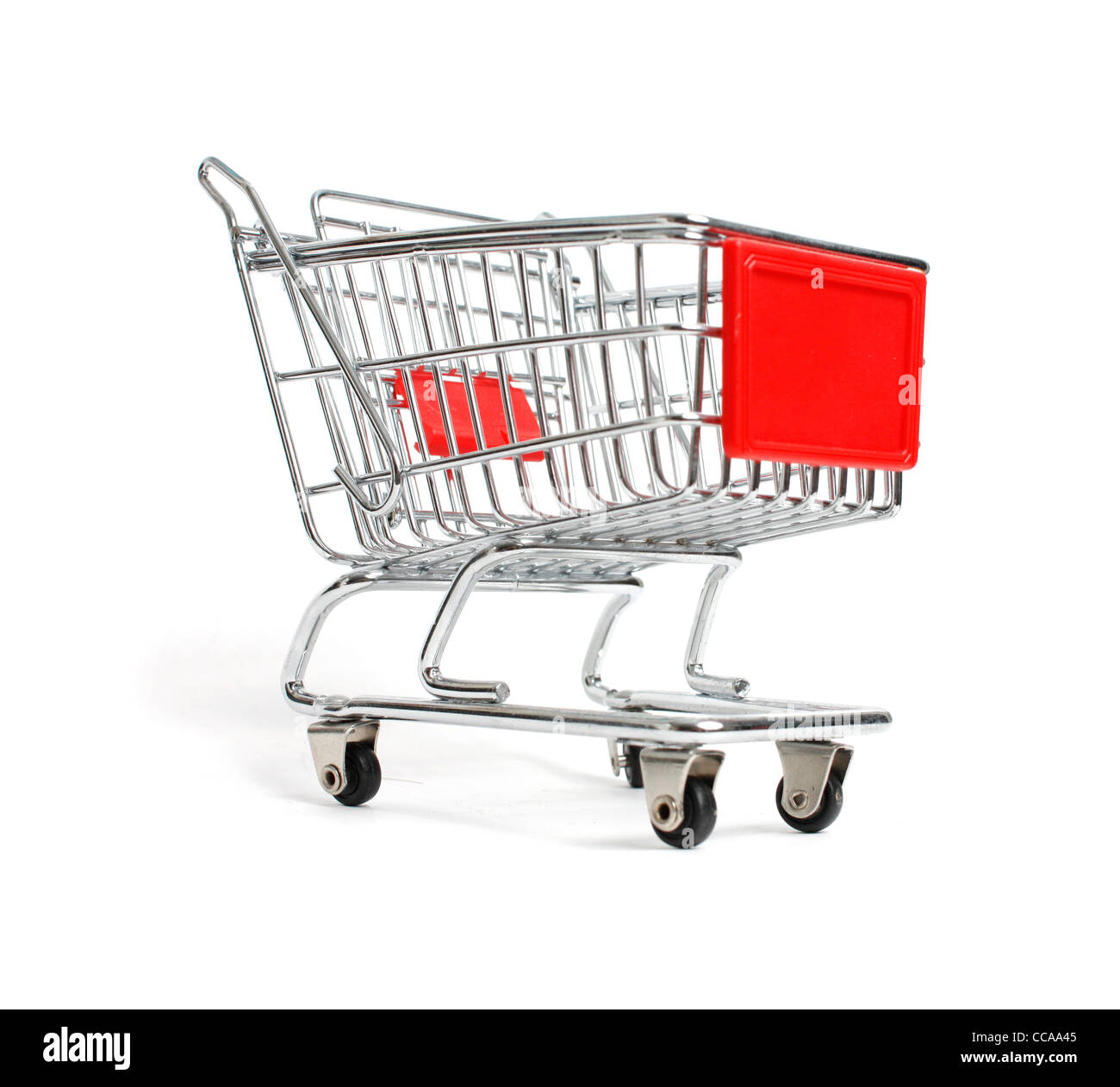 A miniature shopping trolley in studio Stock Photo - Alamy