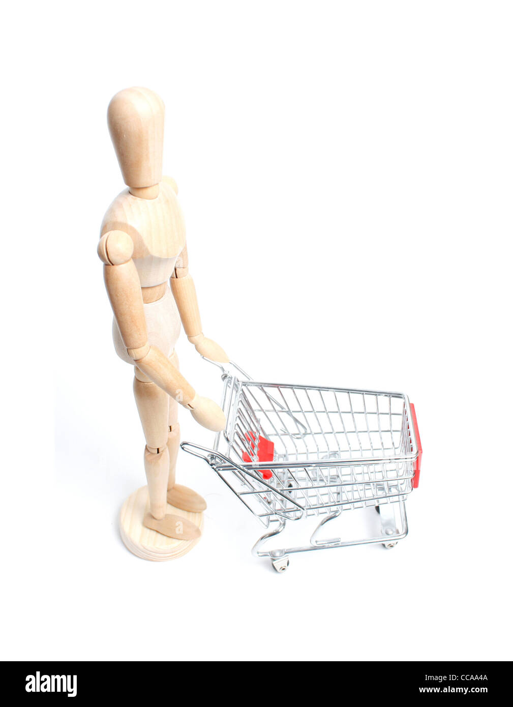 A miniature shopping trolley in studio Stock Photo - Alamy