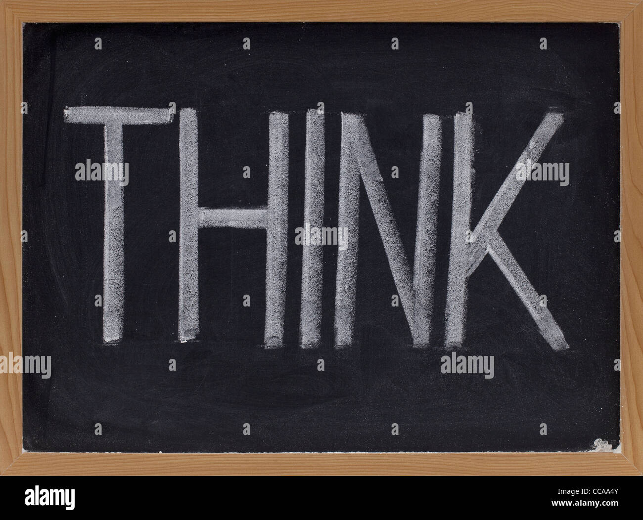 the word think - big letters in white chalk on blackboard Stock Photo ...