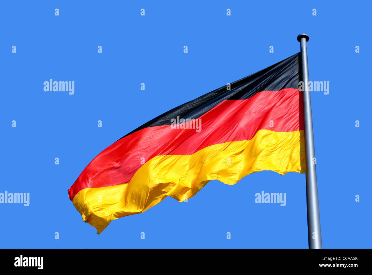 German national flag in front of blue sky in Berlin Stock Photo - Alamy