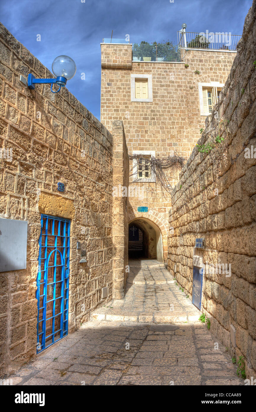 Vertical oriented image of old street and old houses in Jaffa, Israel ...
