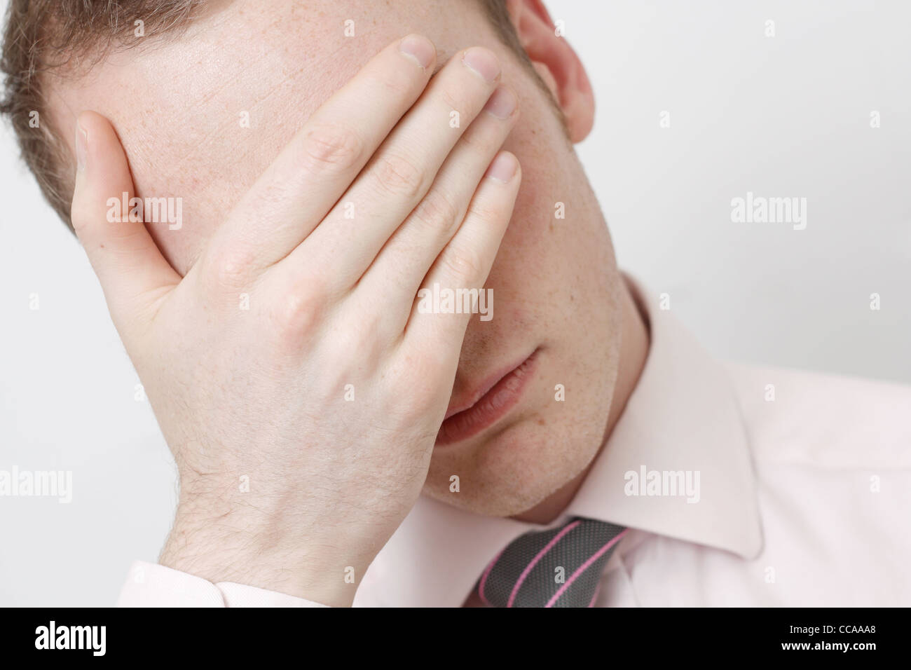 Depressed business man Stock Photo - Alamy