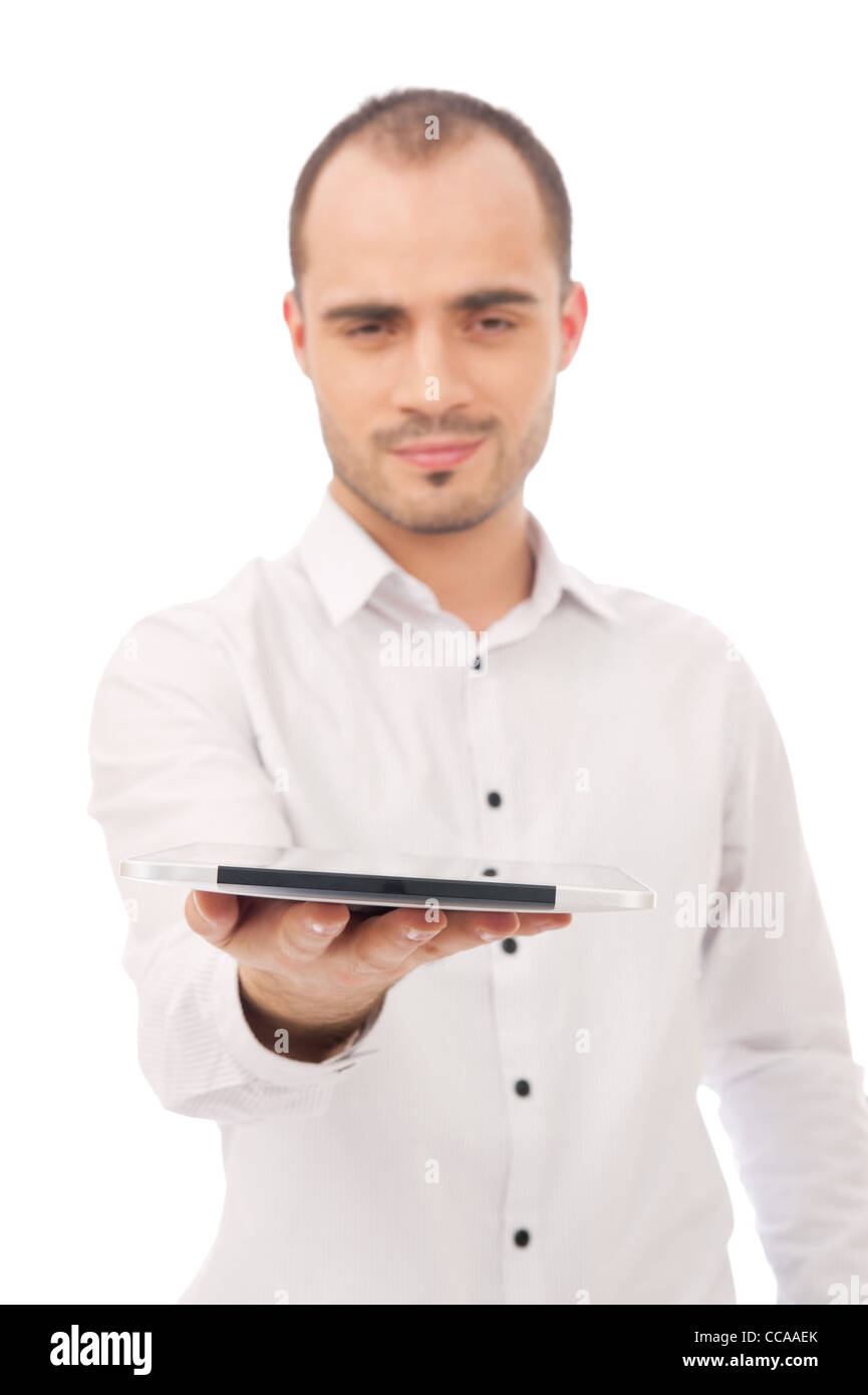 Handsome smiling man with tablet computer. Isolated over white ...
