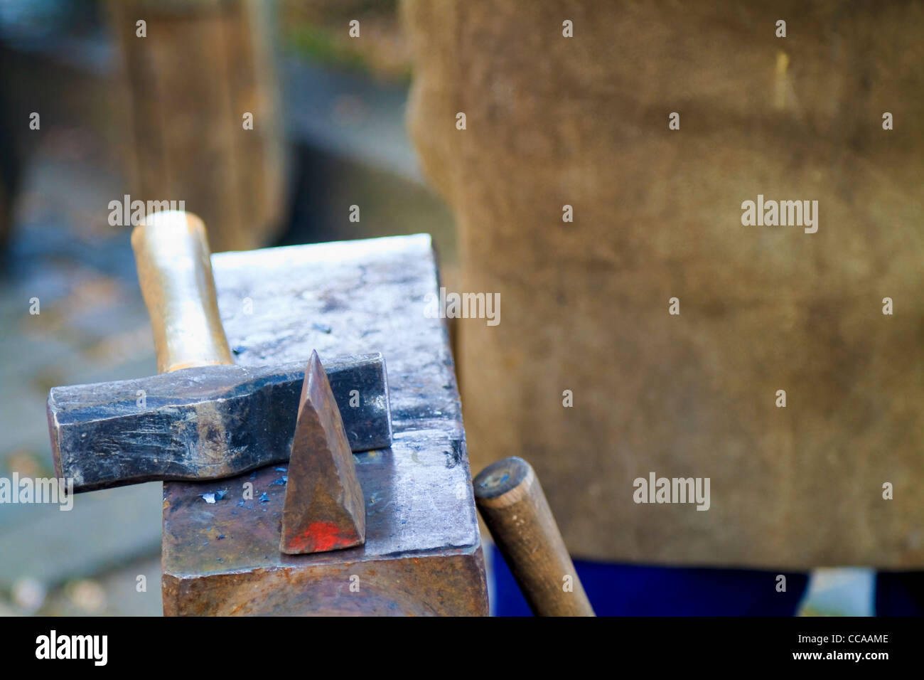 Close up of a traditional blacksmith scene, hammer and anvil Stock ...