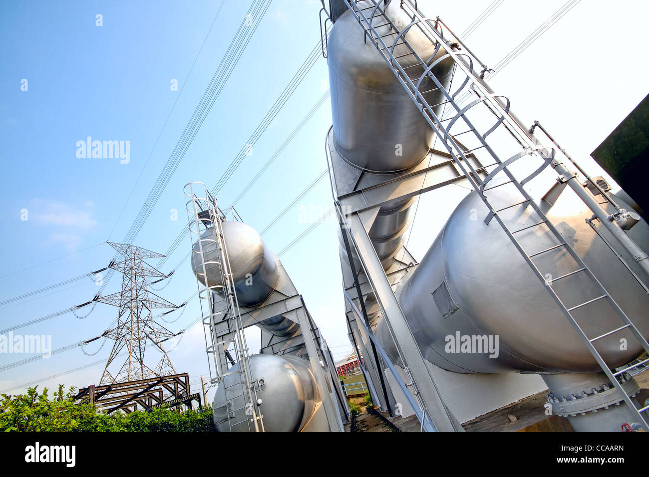 gas container and power tower Stock Photo - Alamy