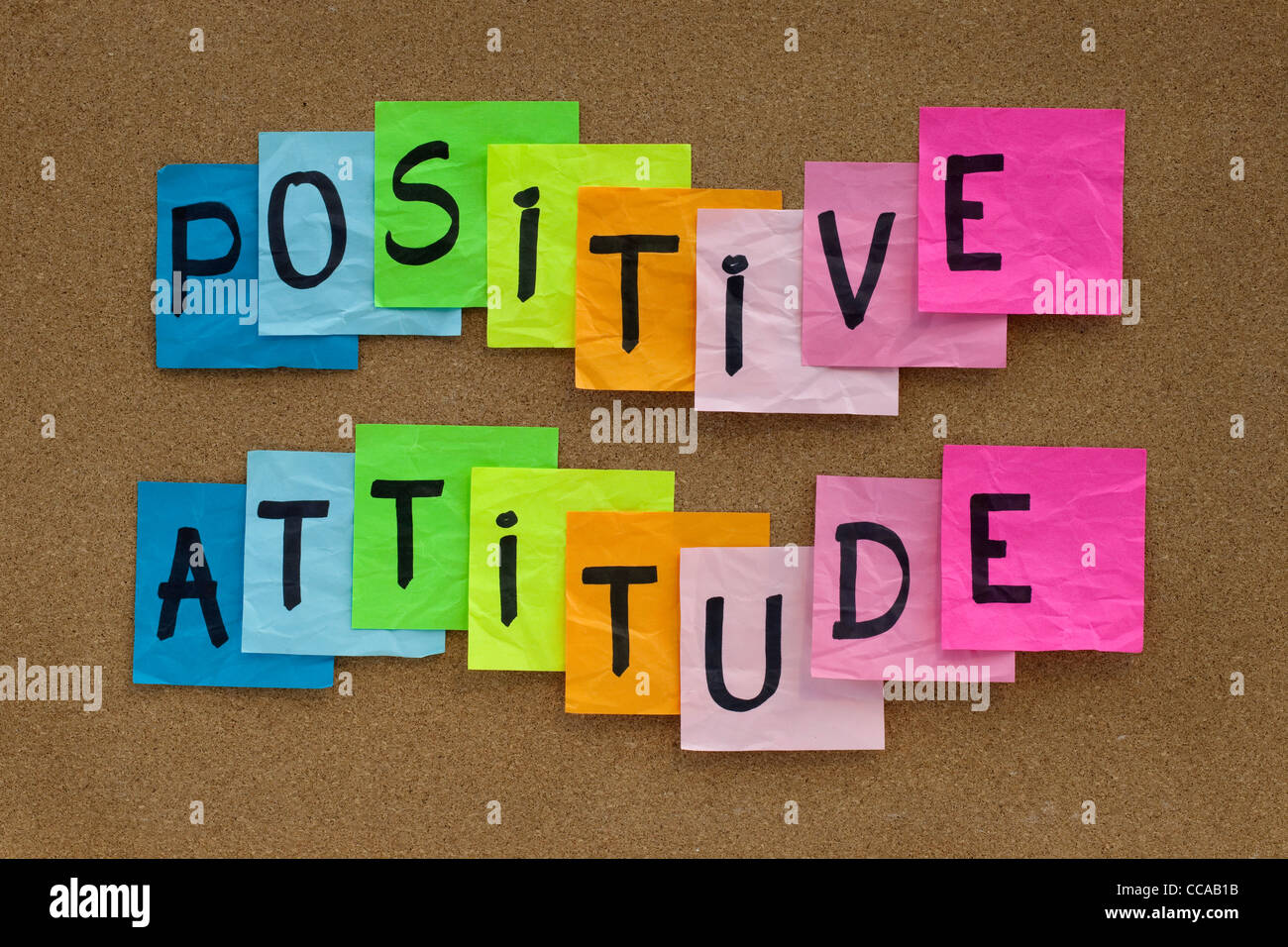 positive attitude concept - colorful sticky notes reminder on cork ...