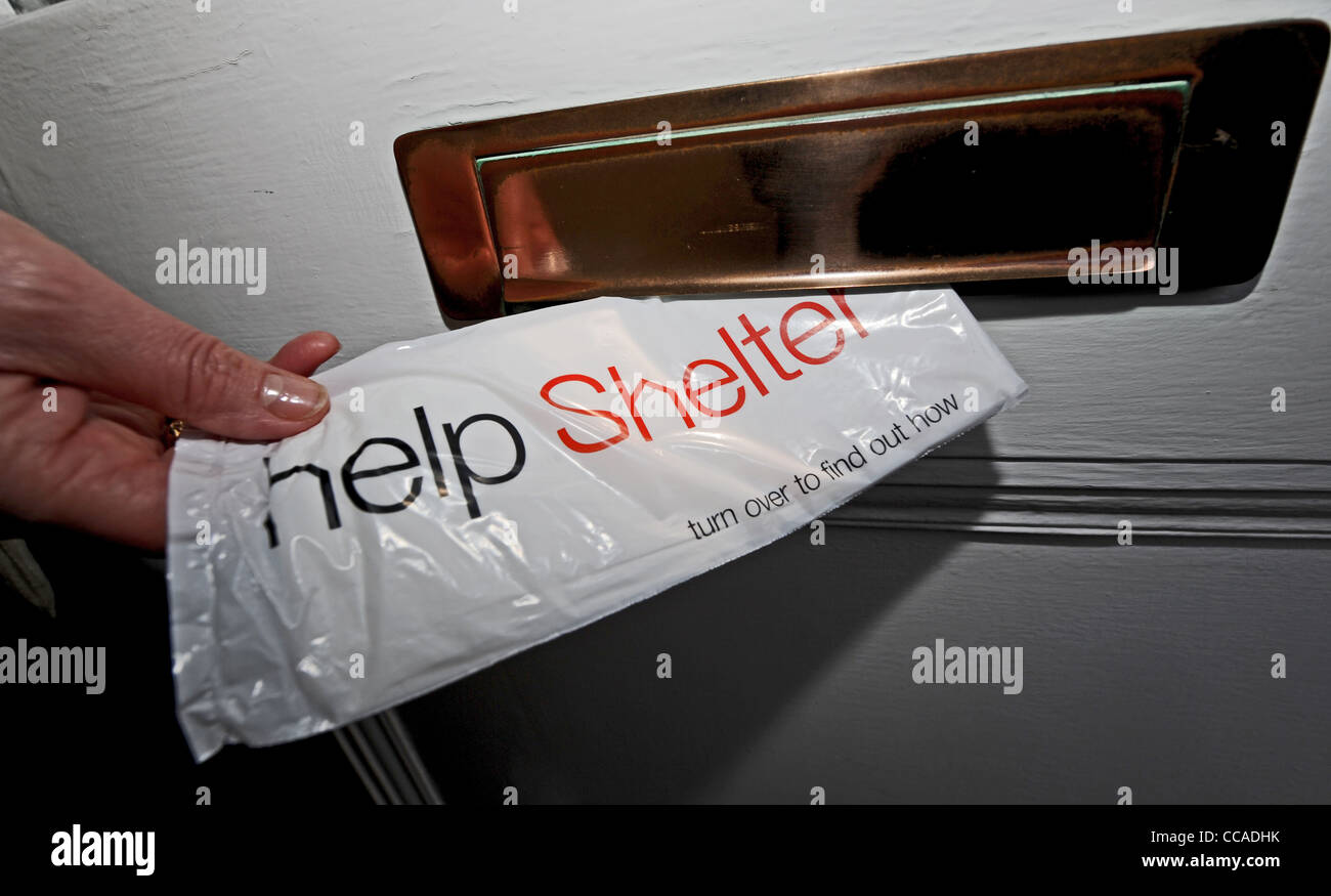 Letter being posted through letterbox hi-res stock photography and ...