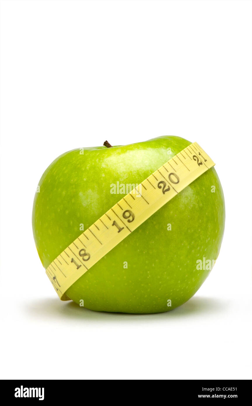 Tape Measure around apple on white Stock Photo - Alamy