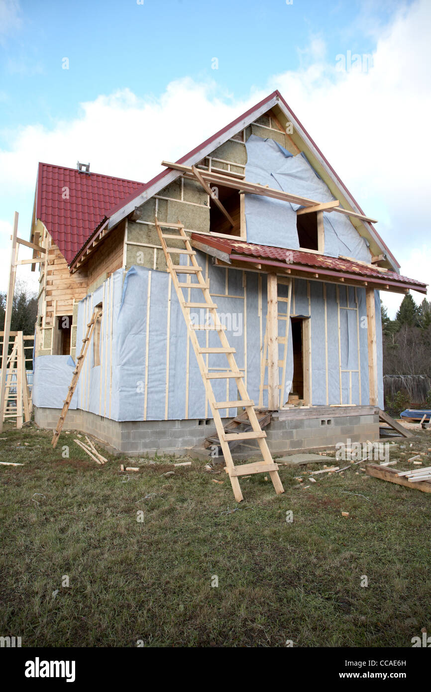 The under construction wooden house autumn Stock Photo - Alamy